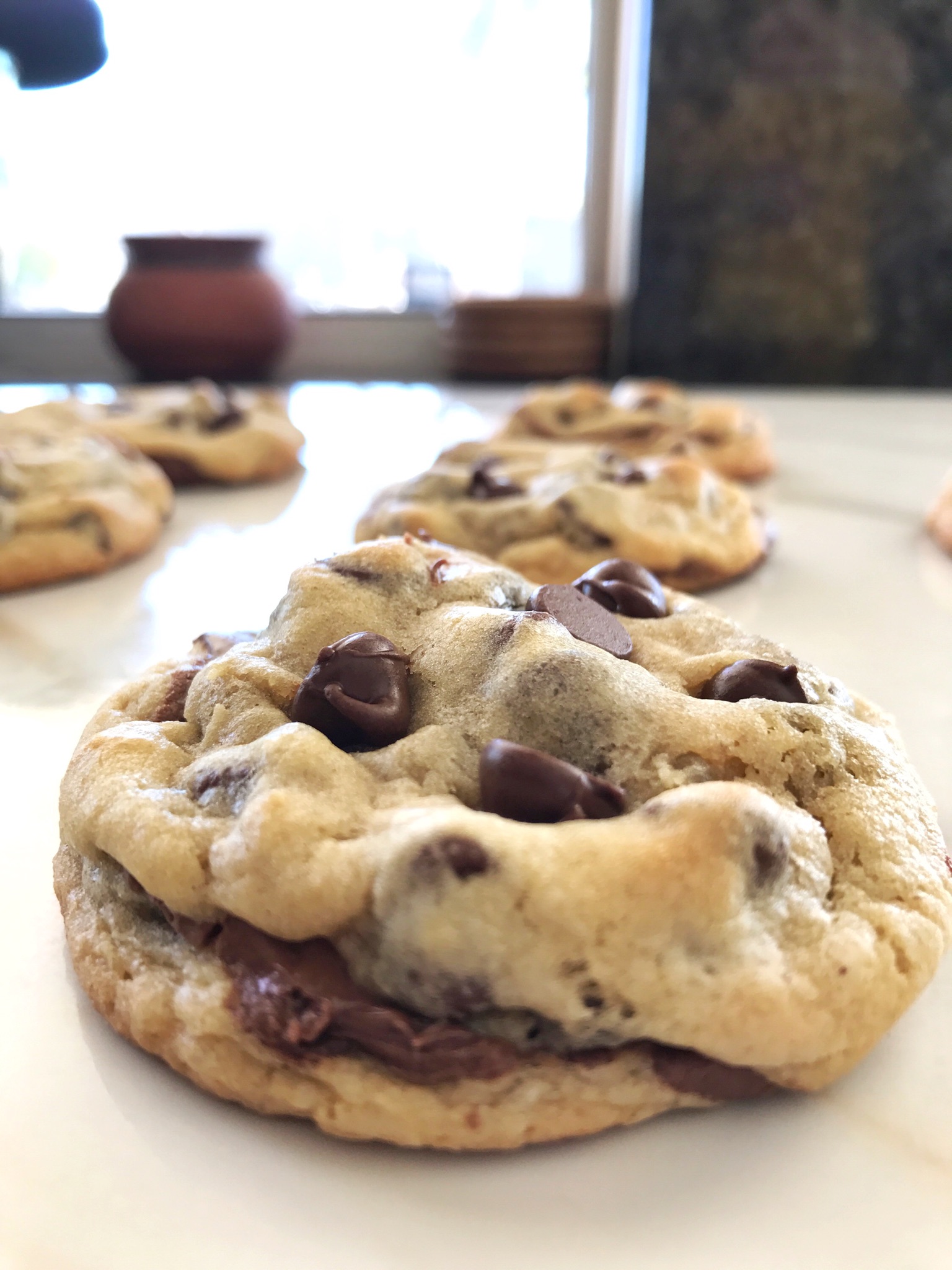 Nutella Stuffed Chocolate Chip Cookies – Jillian Lolo